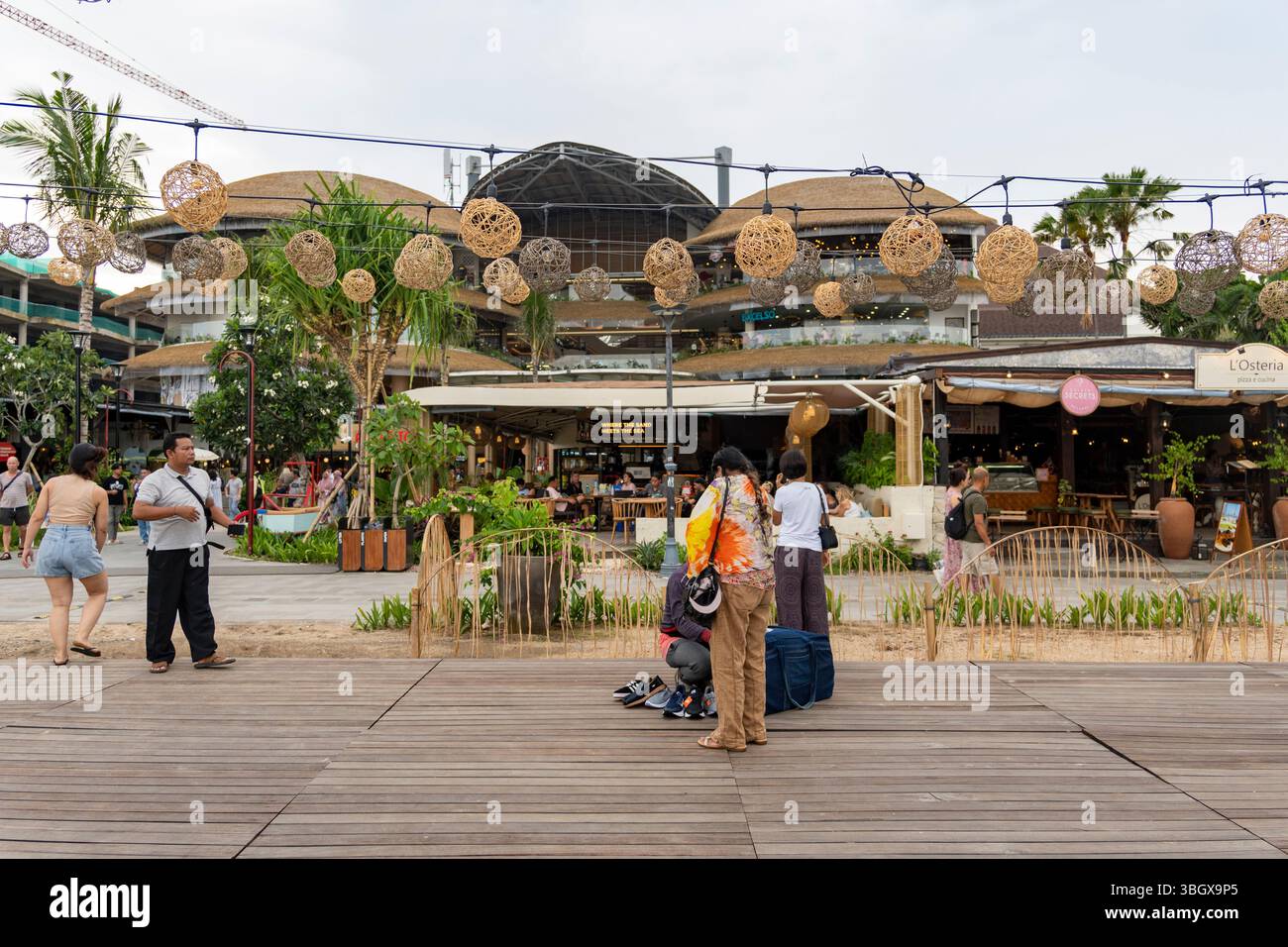 Bali, Indonesia - Dec 17, 2024: Icon Mall Bali. Group of people are ...