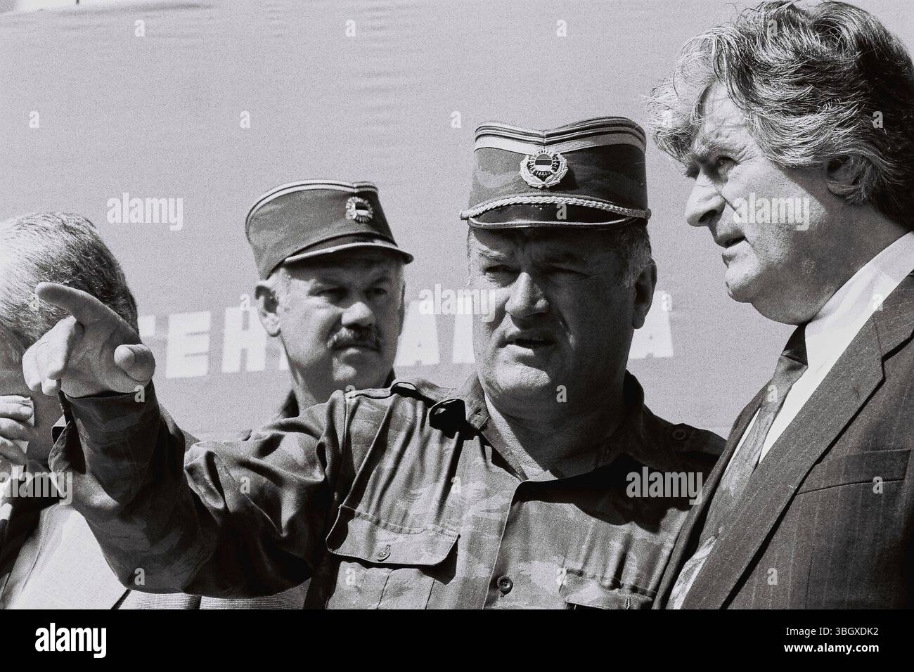 Bosnian Serb General Ratko Mladic, center, speaks with Bosnian Serb ...