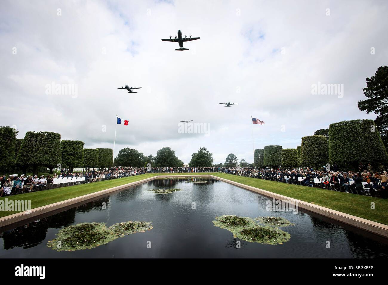 War planes fly over the US cemetery during a ceremony to commemorate ...