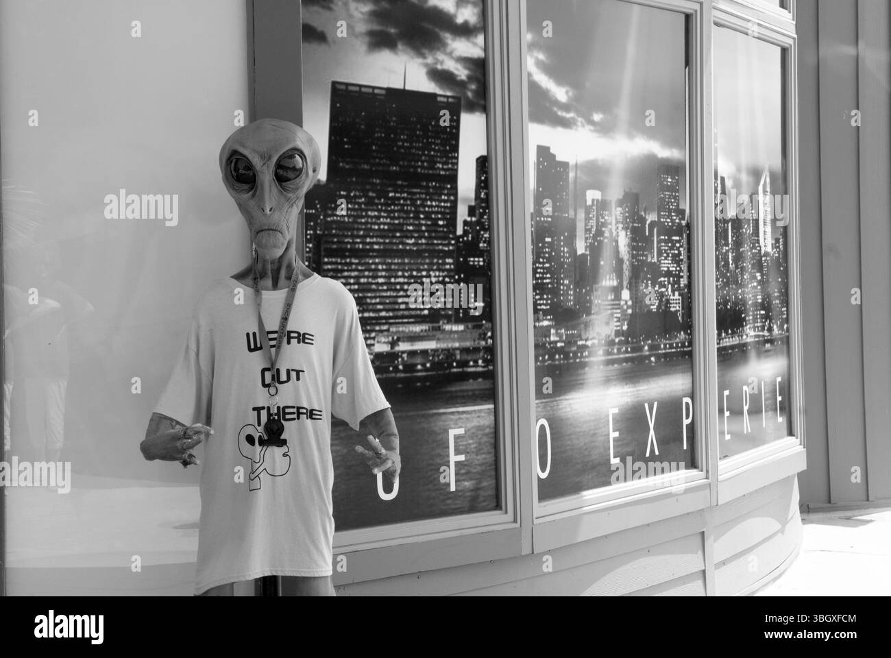 Alien standing outside the Encounters UFO attraction at Broadway at the ...