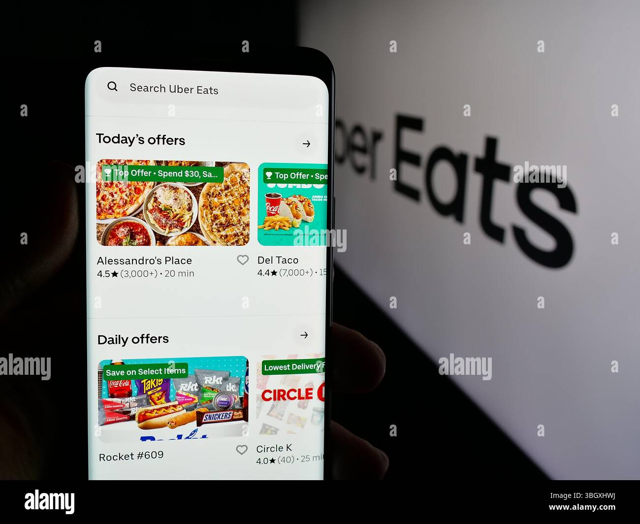 Stuttgart, Germany - 03-12-2025: Person holding smartphone with website ...
