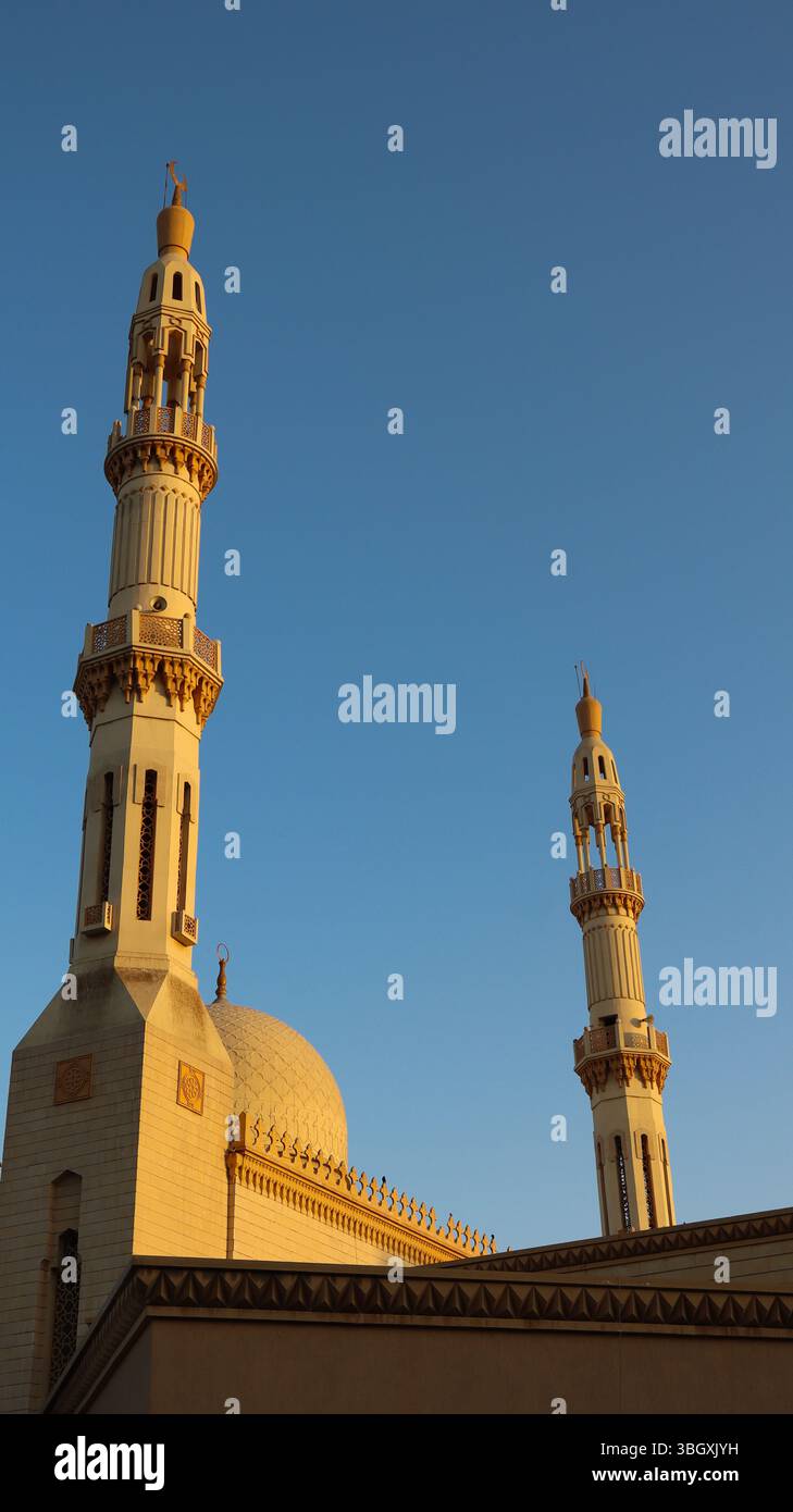 Peaceful mosque in Satwa, Dubai with date palm trees – authentic ...