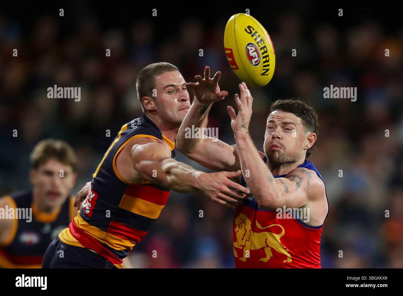 Adelaide, Australia. 06th June, 2025. Sam Berry of the Crows clashes ...