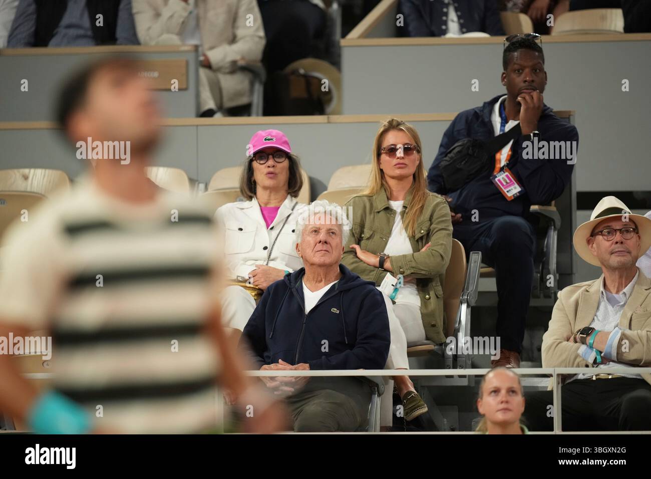 Actor Dustin Hoffman, centre, watches the semifinal match of the French ...