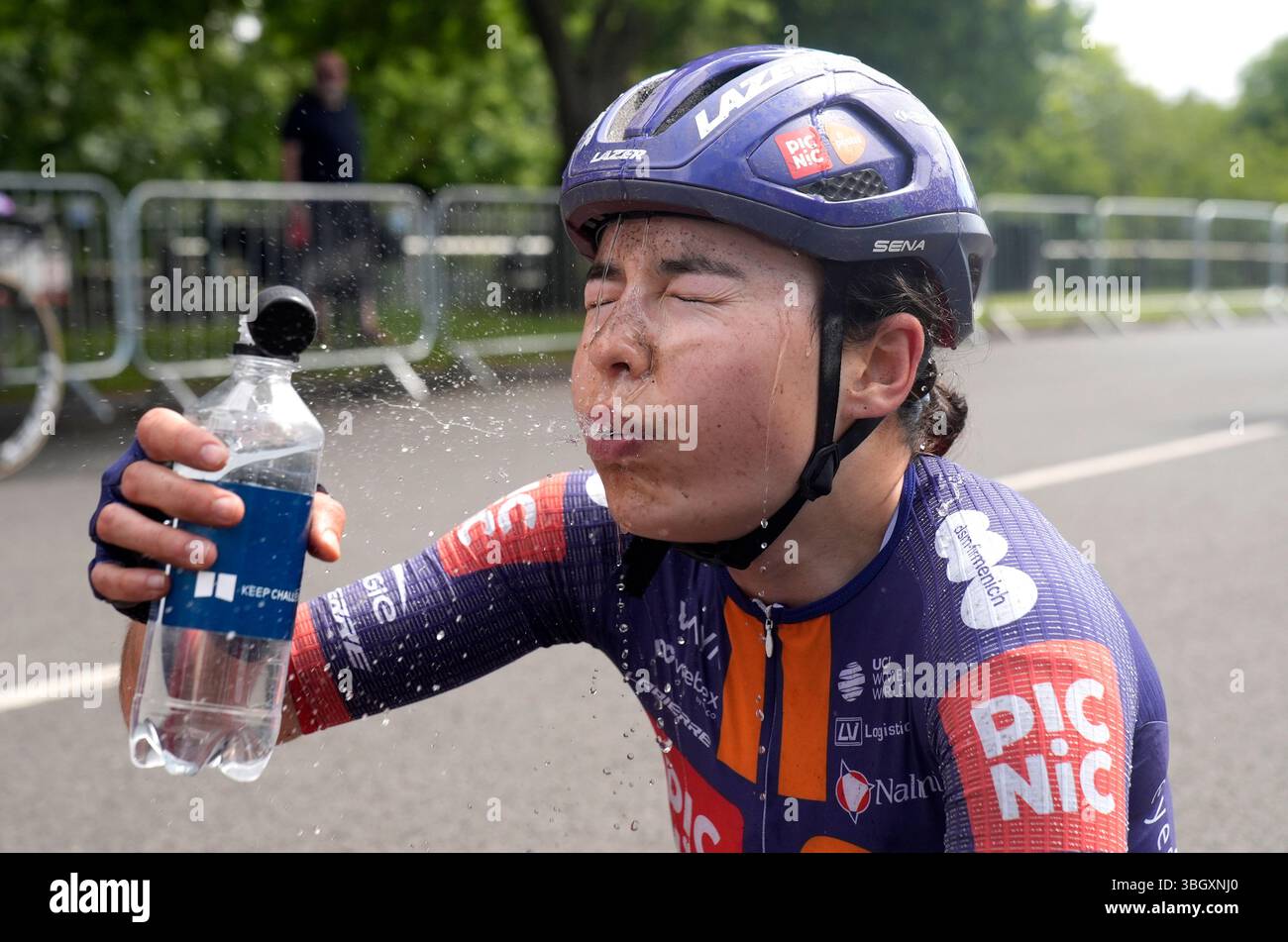 Mara Roldan of Team Picnic PostNL cools down after crossing the finish ...