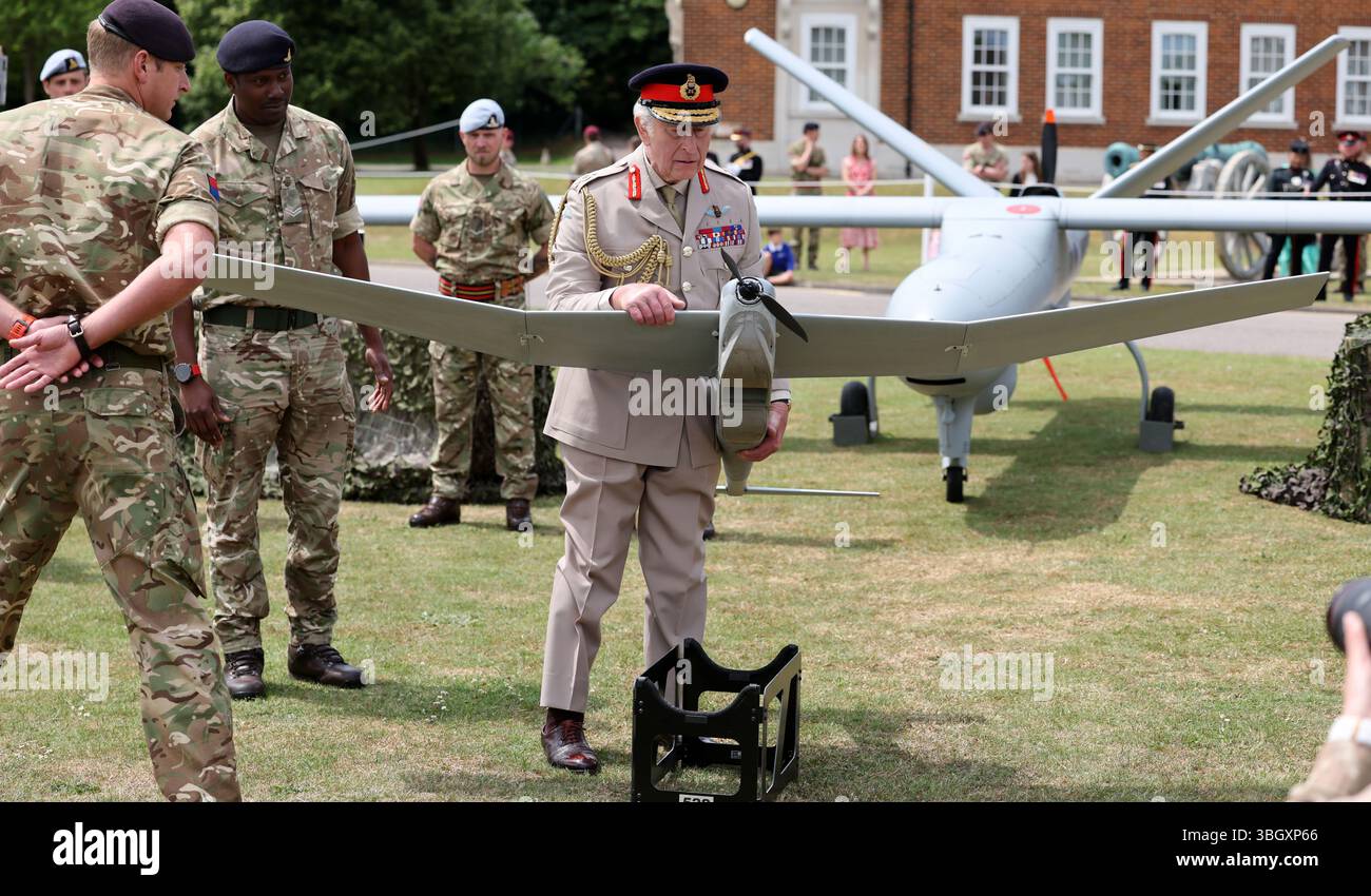 King Charles III views a Puma AE reconnaissance drone during his visit ...