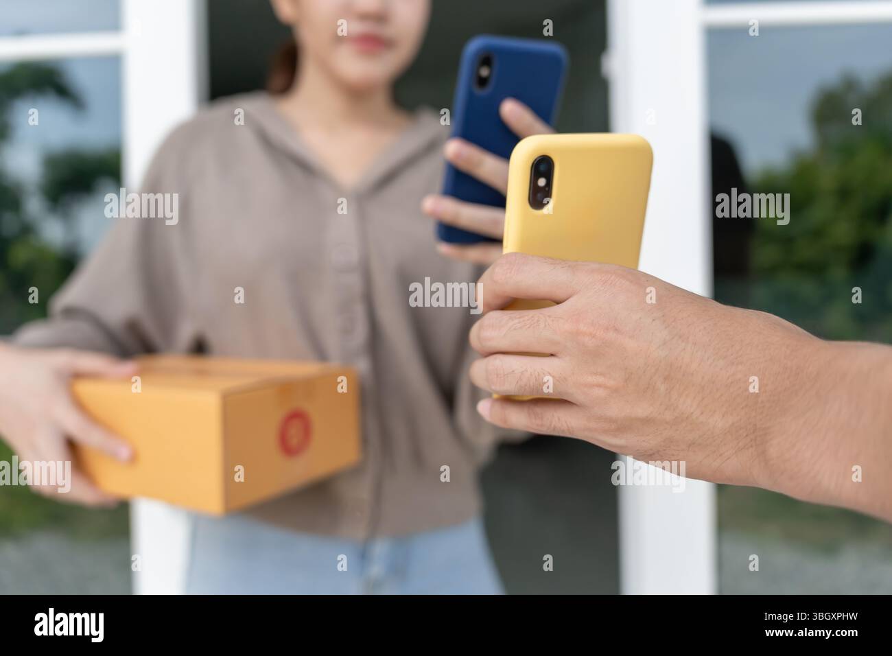 Happy smile Asian woman scan QR code for pay of food. Delivery man send ...