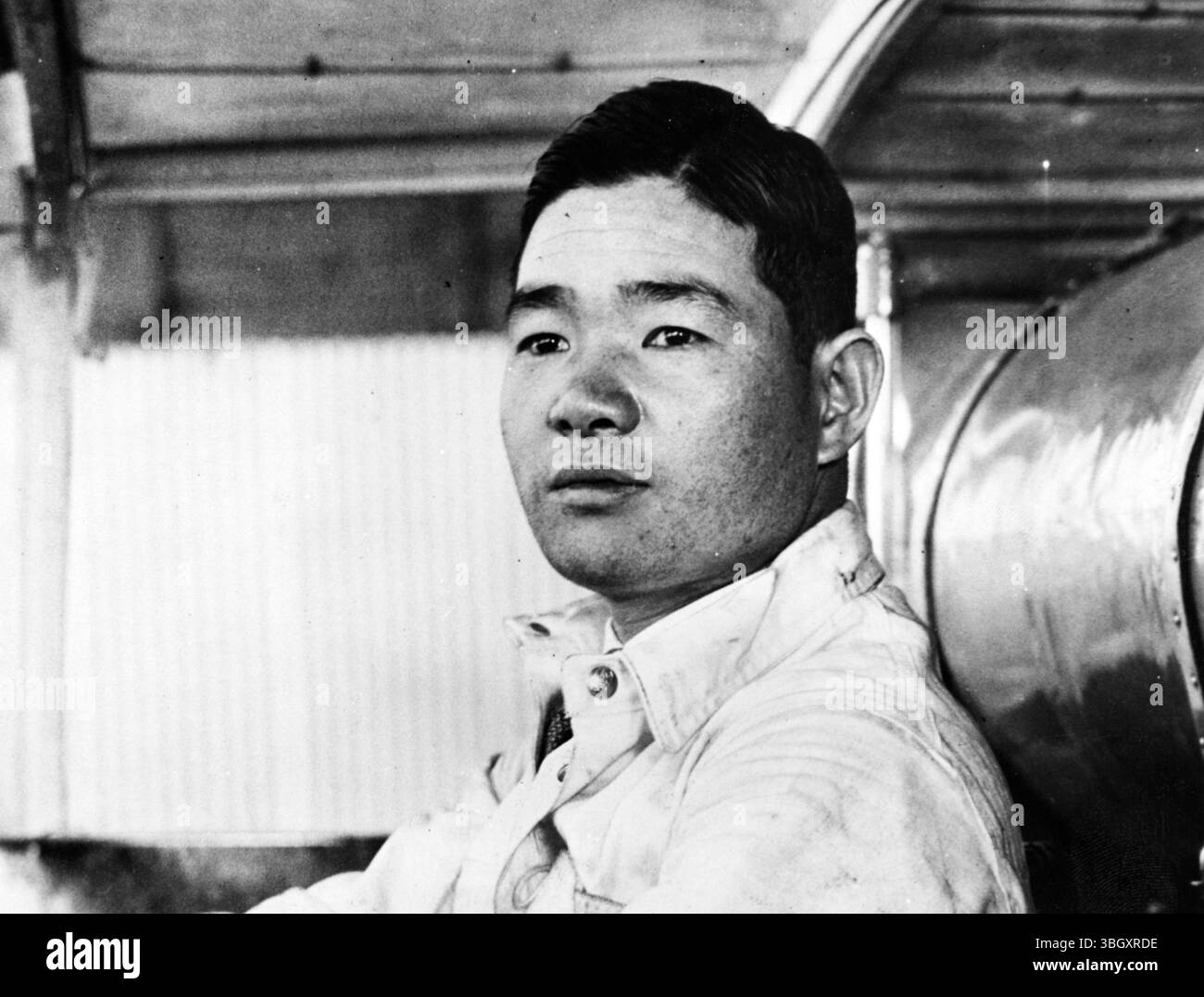 Japanese Aviator Ishihara seen in the cockpit of his seaplane in ...