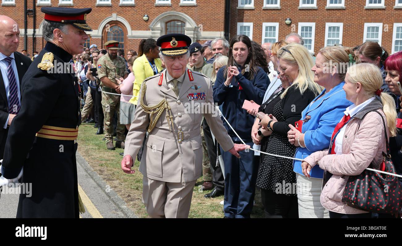 King Charles III meets family members of service personnel during his ...