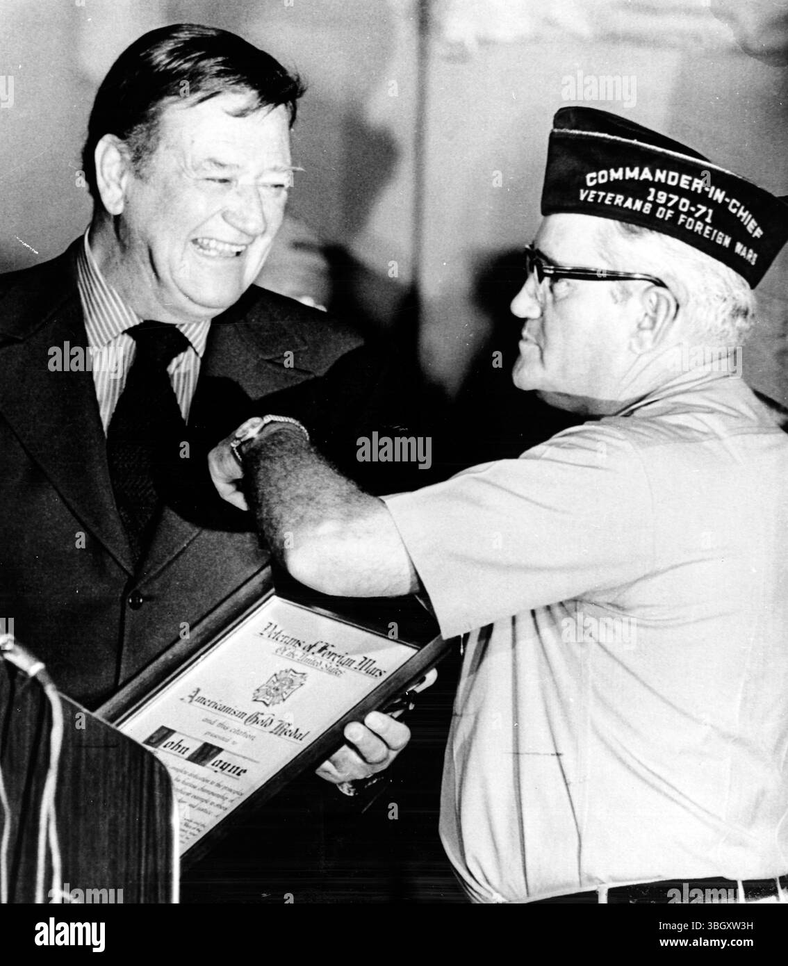 Actor John Wayne (left) accepts the Veterans of Foreign Wars ...