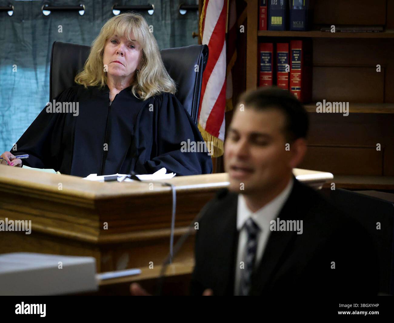 Judge Beverly Cannone, left, listens as accident reconstruction ...