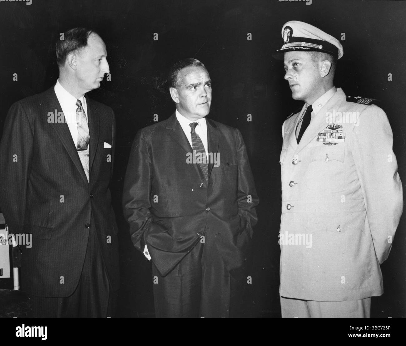 Left to right: John W. Simpson, Mark W. Cresap Jr. and Commander ...
