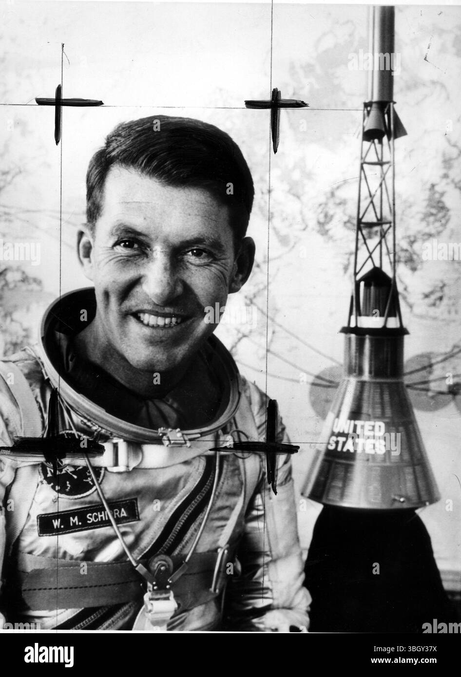 Project Mercury astronaut Walter M. Schirra Jr. in the background is a ...