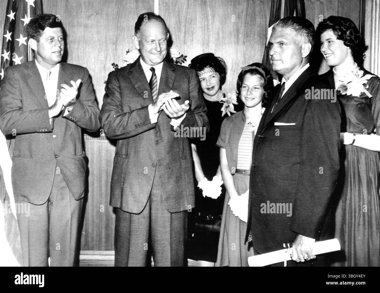 President John F. Kennedy and Treasury Secretary Douglas Dillon applaud ...