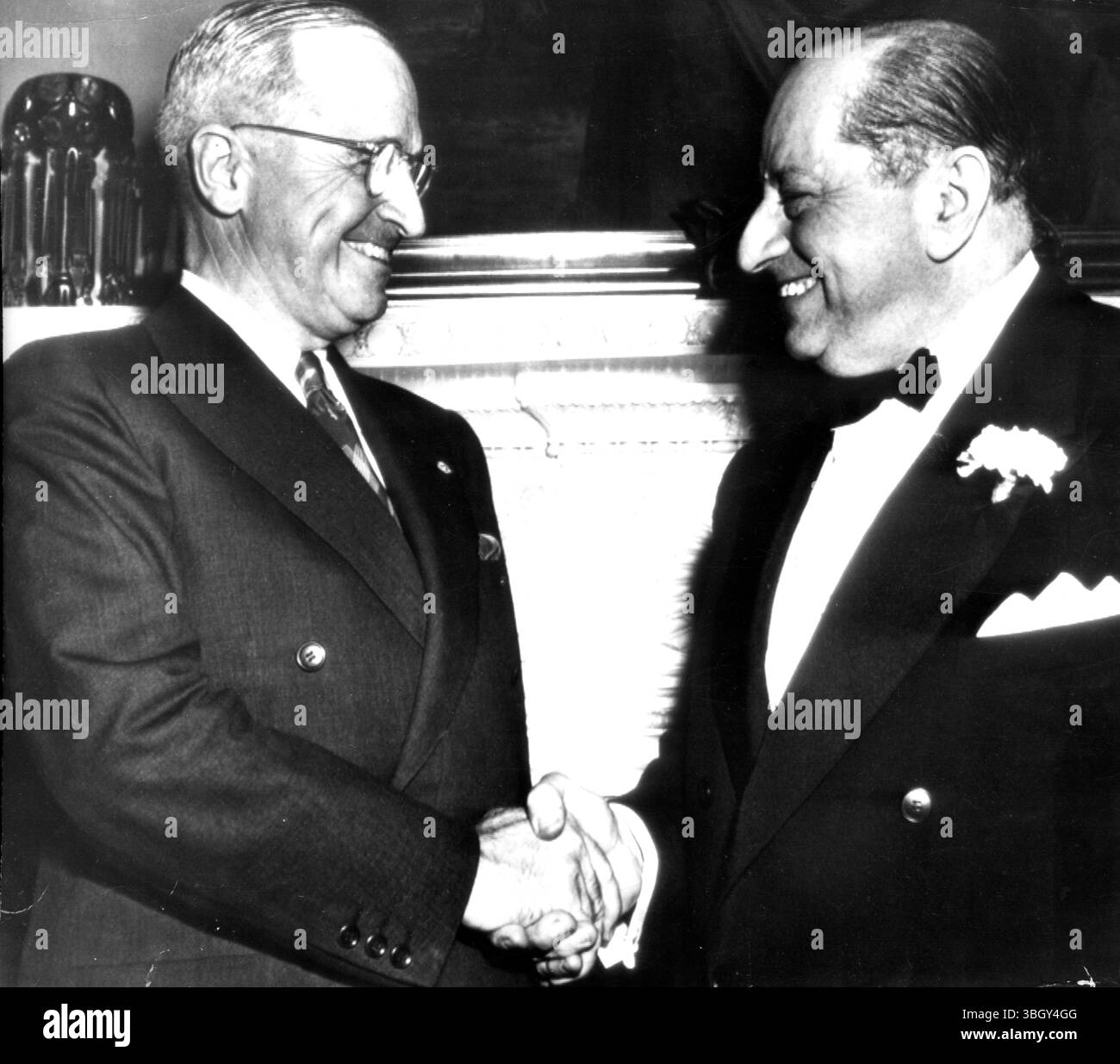 President Truman shakes hands with Sigmund Romberg before the latter ...