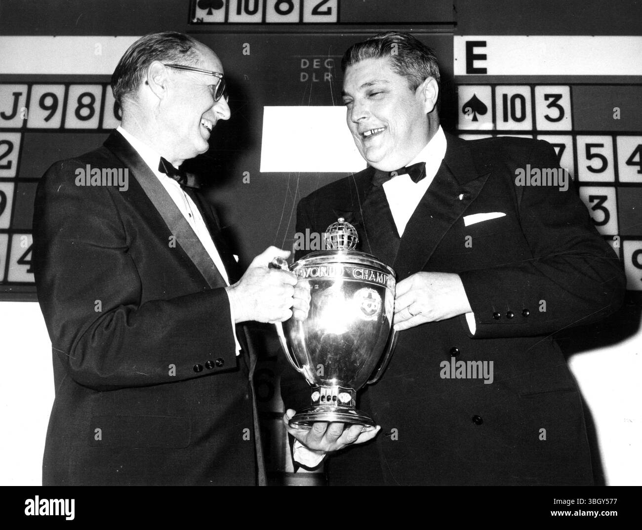 Winslow Randall (left), president of American contract Bridge league ...