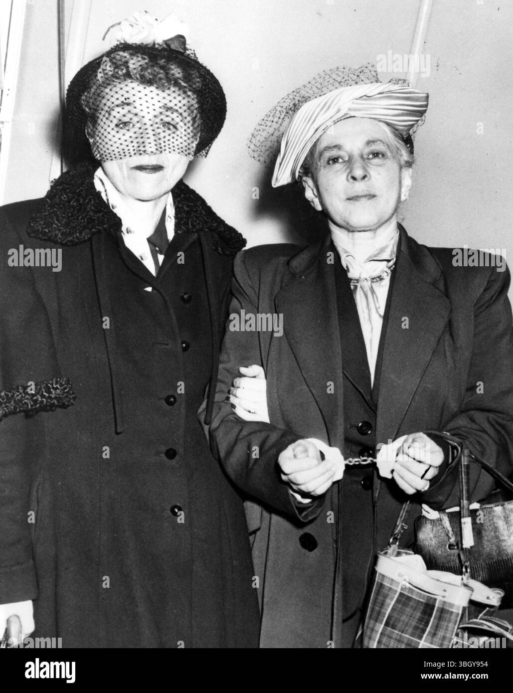 Handcuffed Mrs Elizabeth Moos (right), former mother-in-law of William ...