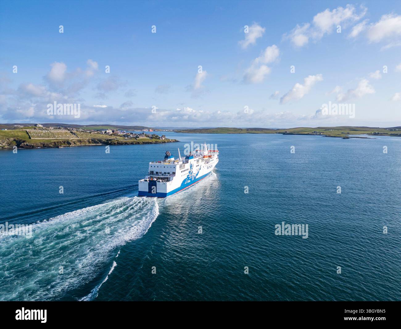 Aerial drone view of NorthLink ferry berthing in Lerwick Harbour ...