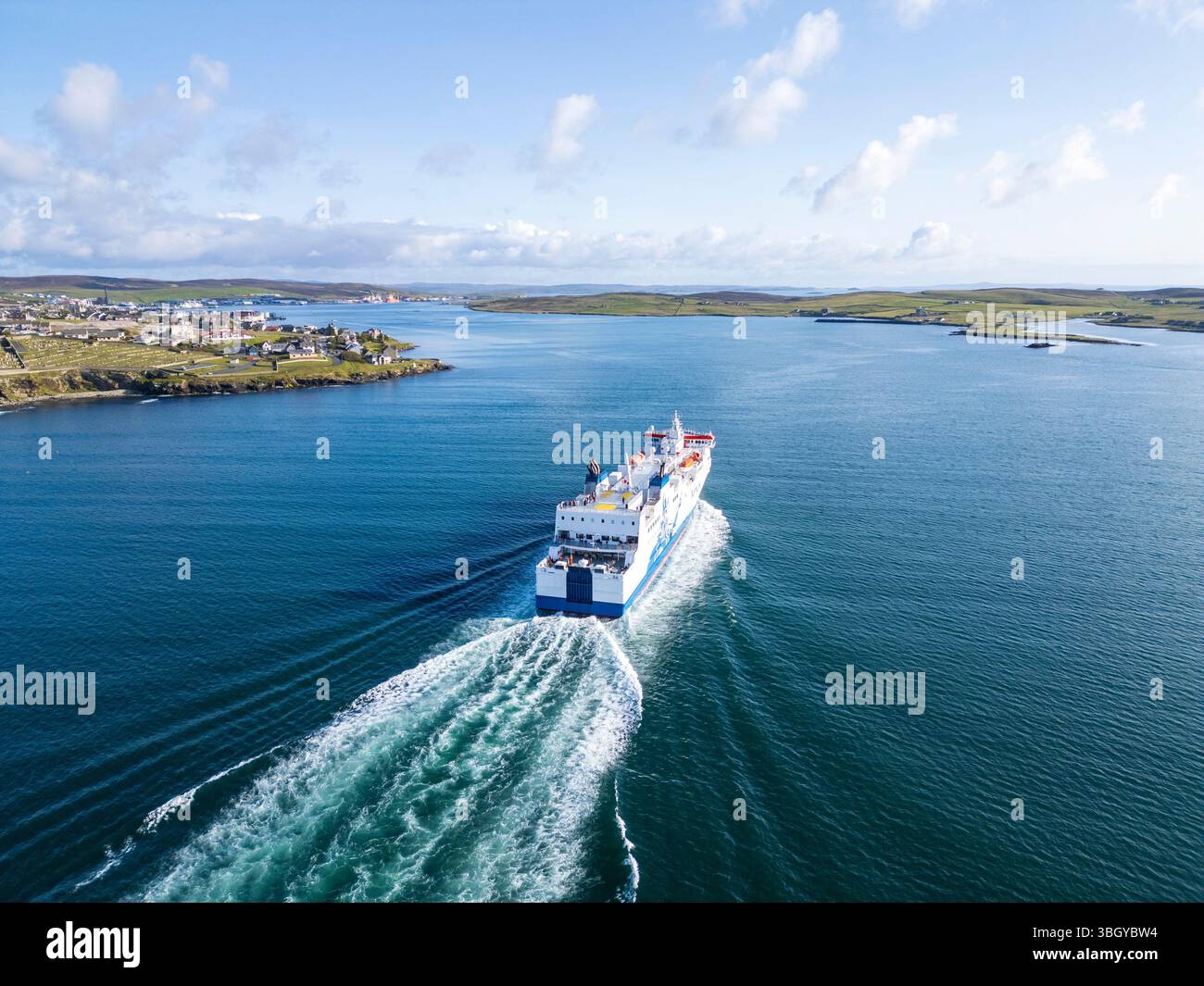 Aerial drone view of NorthLink ferry berthing in Lerwick Harbour ...