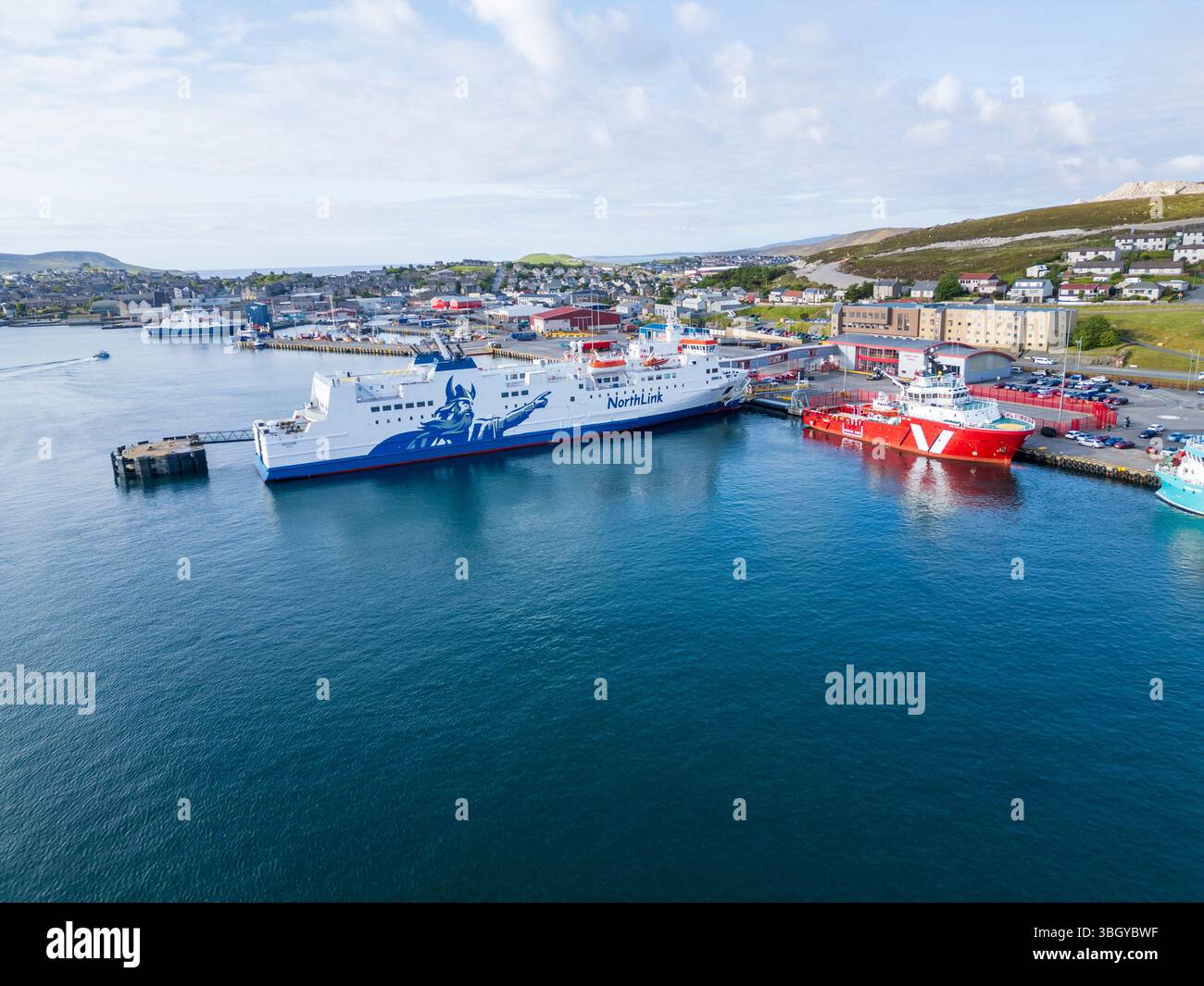 Aerial drone view of NorthLink ferry berthing in Lerwick Harbour ...