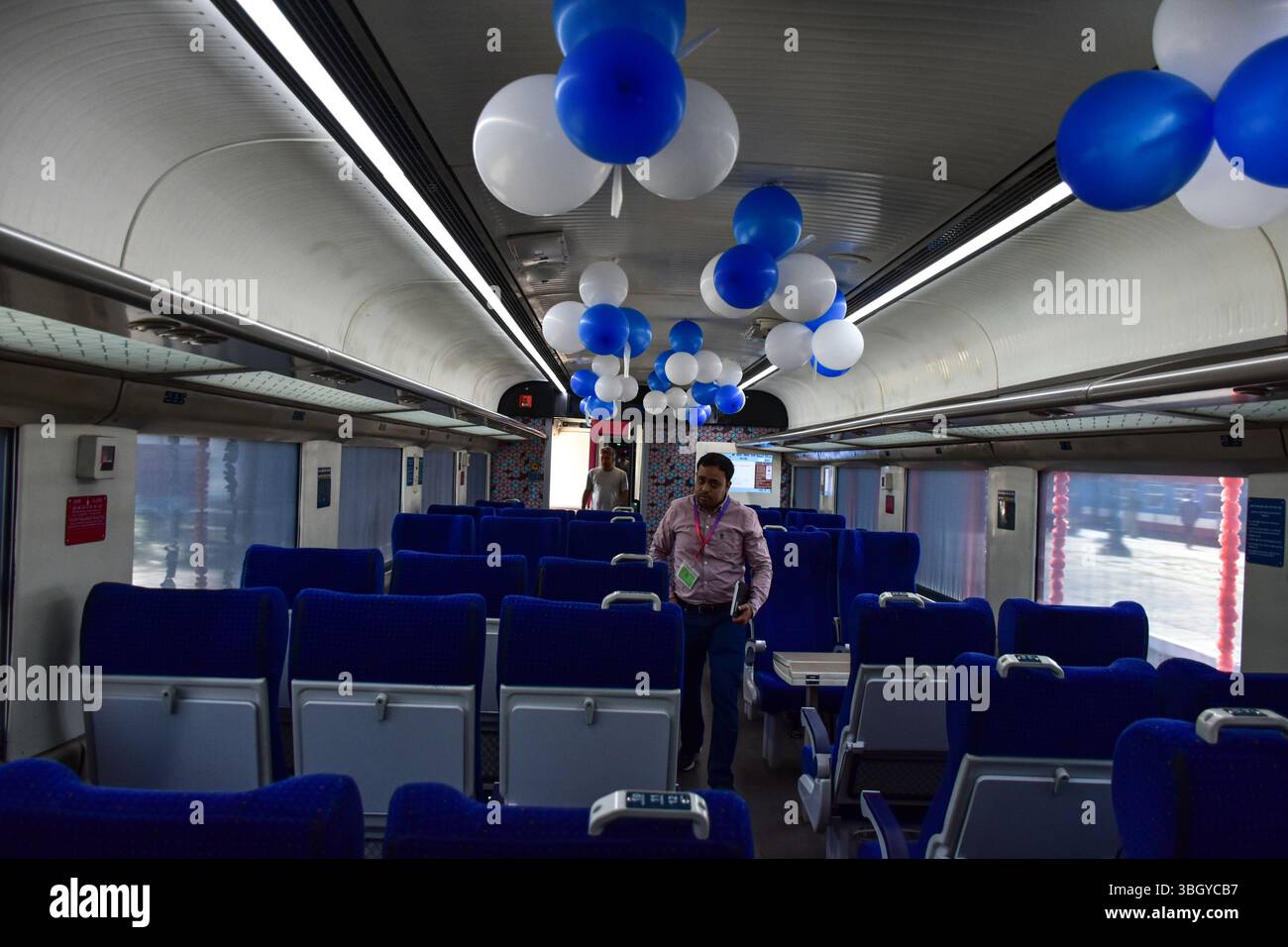 Srinagar, India. 06th June, 2025. A passenger boards the Vande Bharat ...