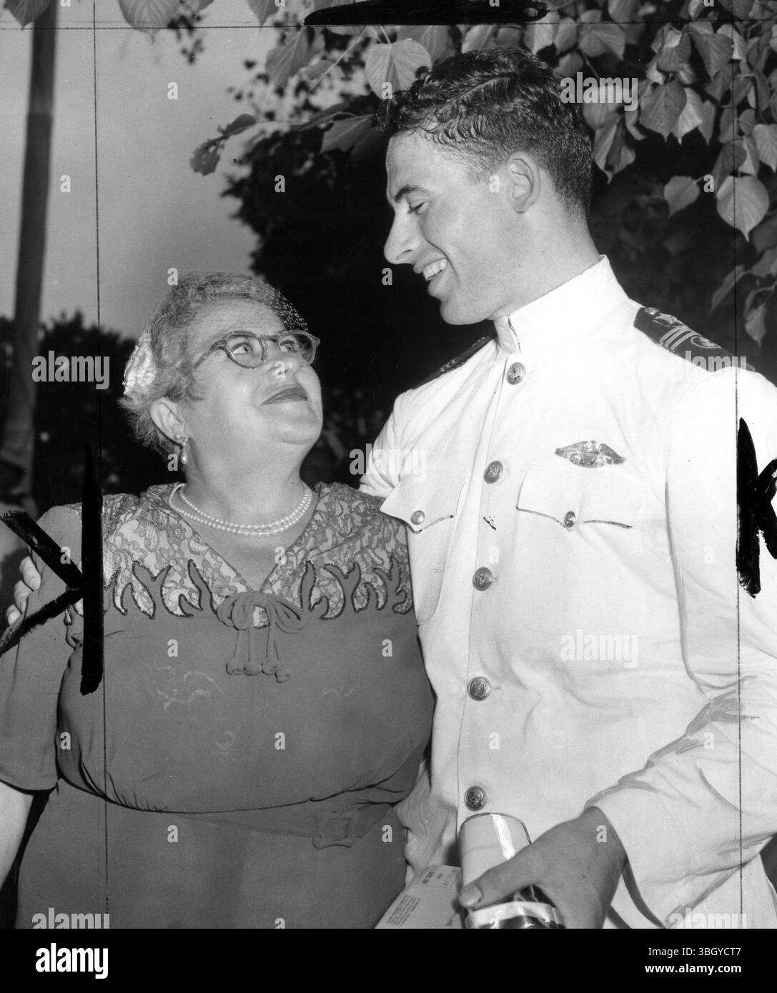 Eugene William Landy, hugs his mother, Mrs Deborah Landy, at Kings ...
