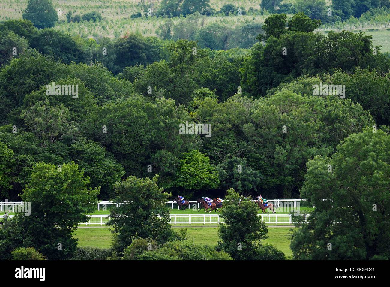 Runners and riders at the start of the Betfred Oaks at Epsom Downs ...