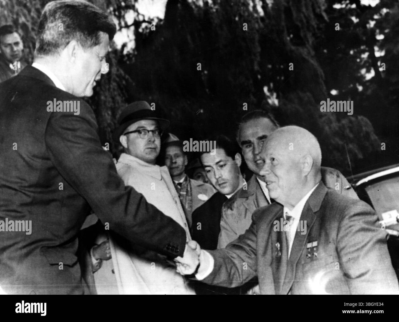 John Fitzgerald Kennedy and Nikita Khrushchev shake hands prior to the ...