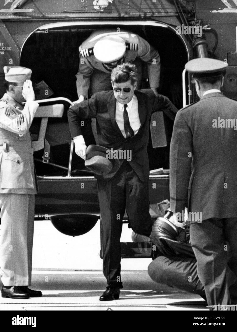 Despite his back injury, President John Fitzgerald Kennedy steps ...