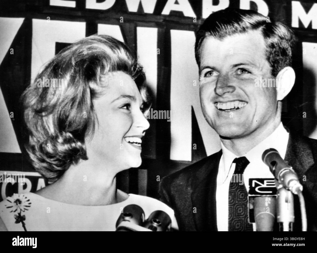 Edward Kennedy and his wife, Joan, display their victory smile attheir ...