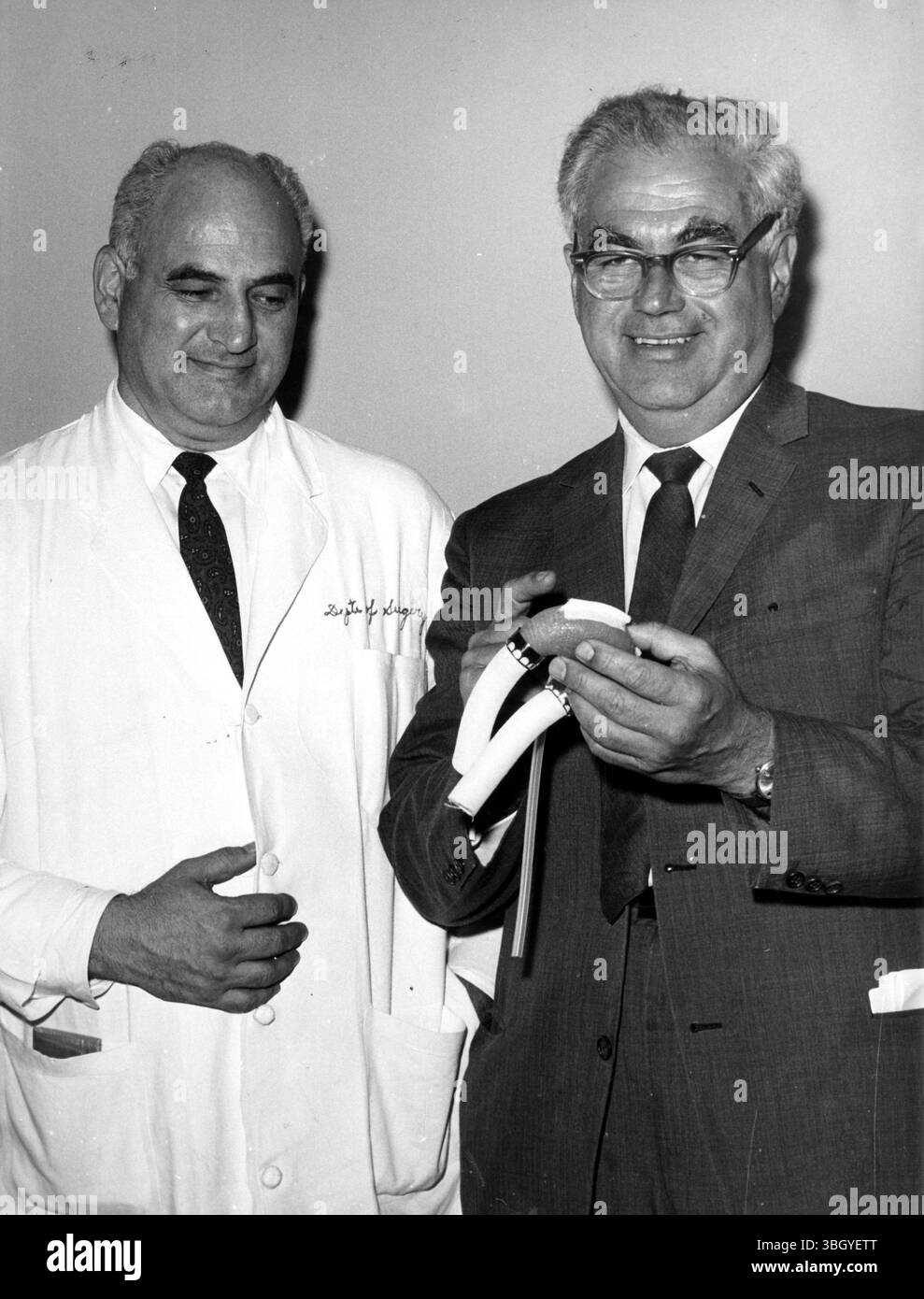 Dr Adrian Kantrowitz (left) beams as his brother Dr Arthur Kantrowitz ...