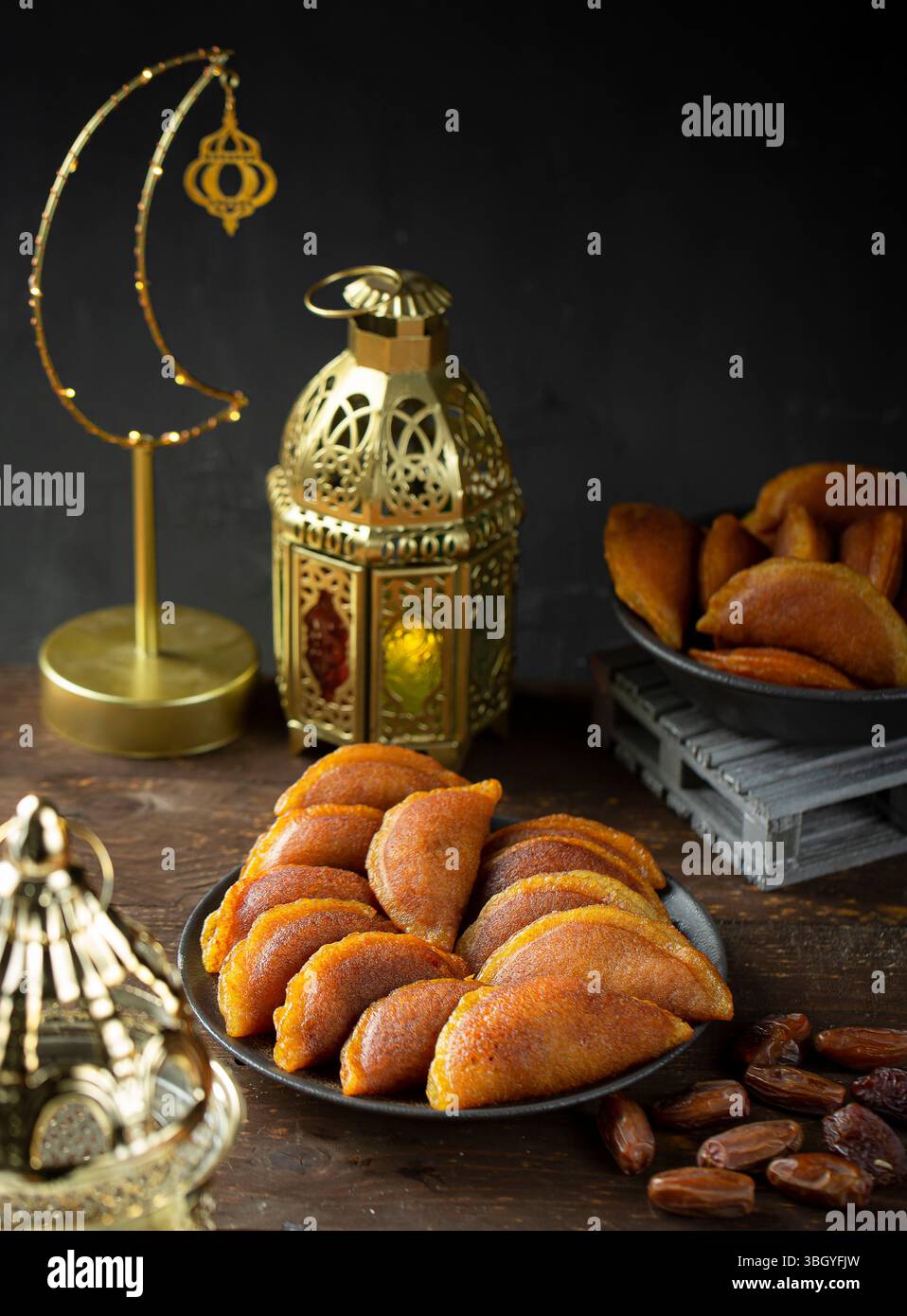 Qatayef, traditional crispy Arabic Middle Eastern dessert Stock Photo ...