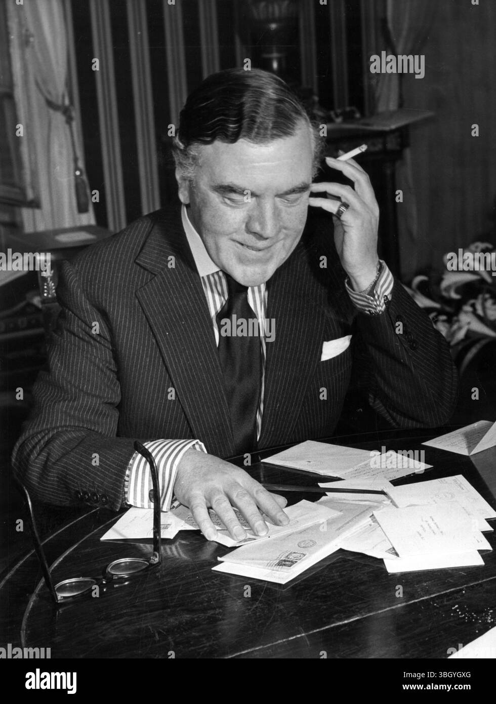 Famous London fashion designer Norman Hartnell seen in his Bruton ...