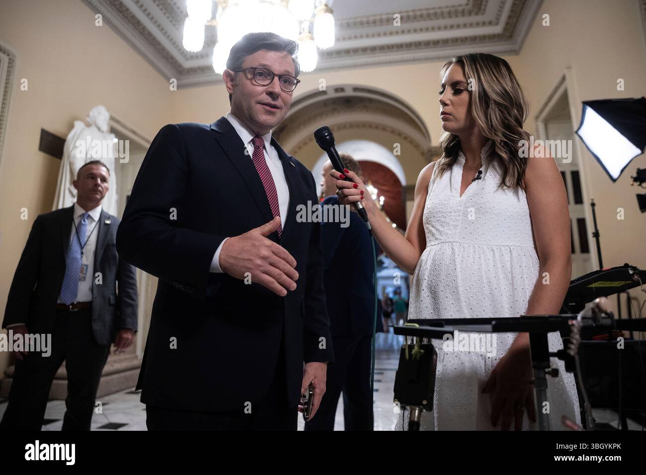 House Speaker Mike Johnson (R-La.) speaks with a reporter at the U.S ...