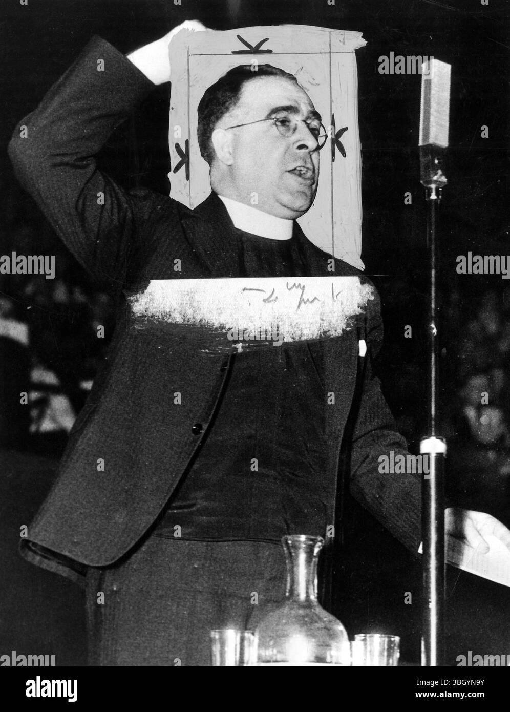 The Reverend Charles E Coughlin shown addressing a crowd at the Olympia ...