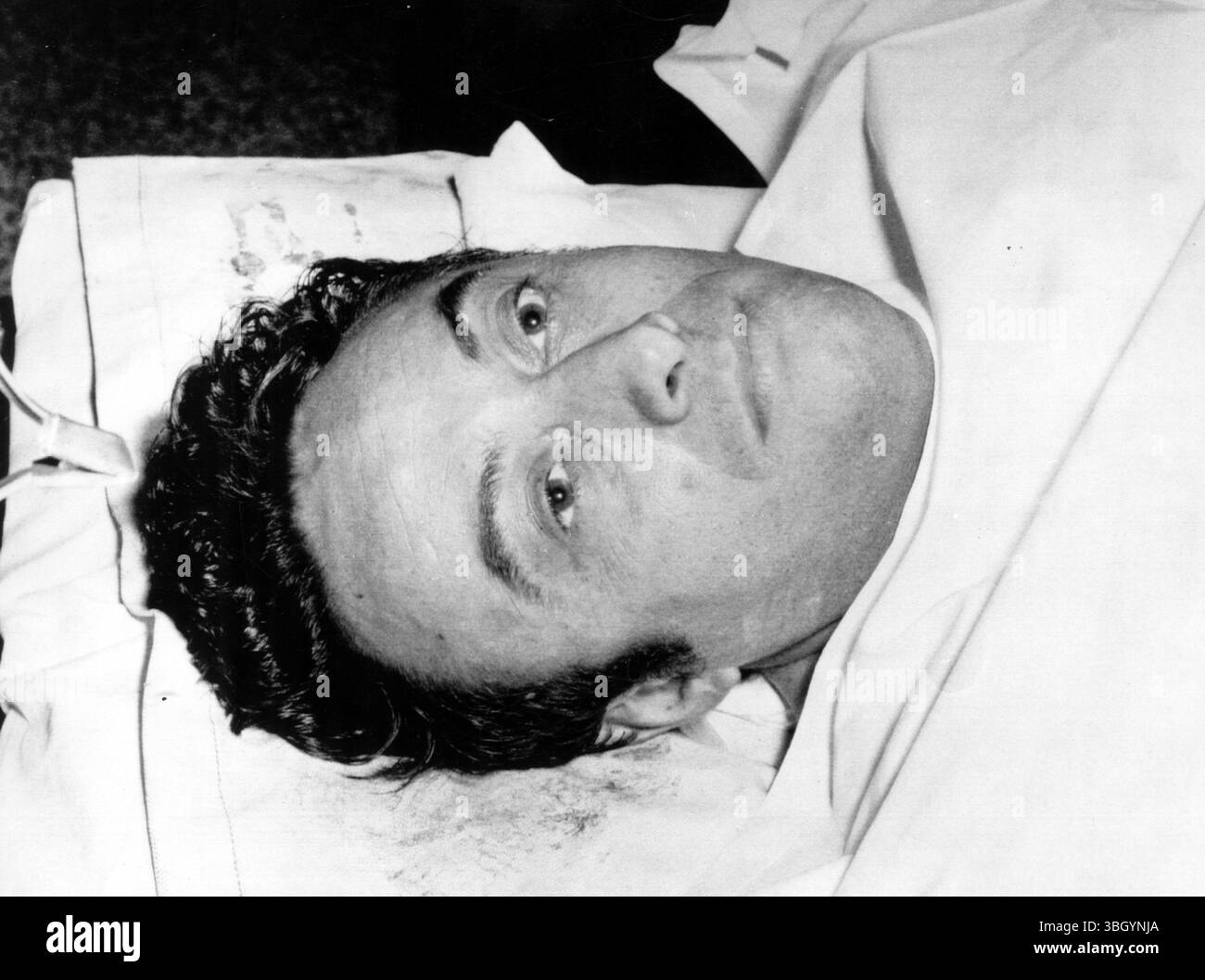NIghtclub comedian Lenny Bruce lies quietly in a hospital bed suffering ...