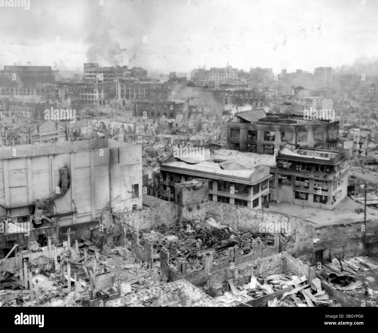 Aerial view of Manila showing the damage done by Japanese demolition ...