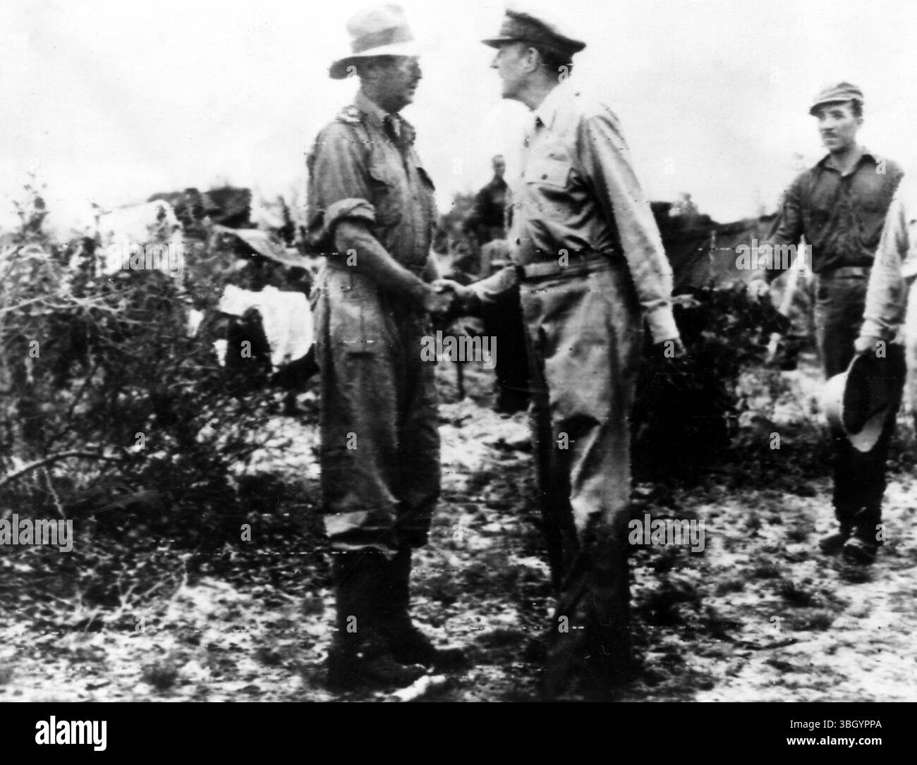 General Douglas MacArthur (right) congratulaters Brigadier General ...