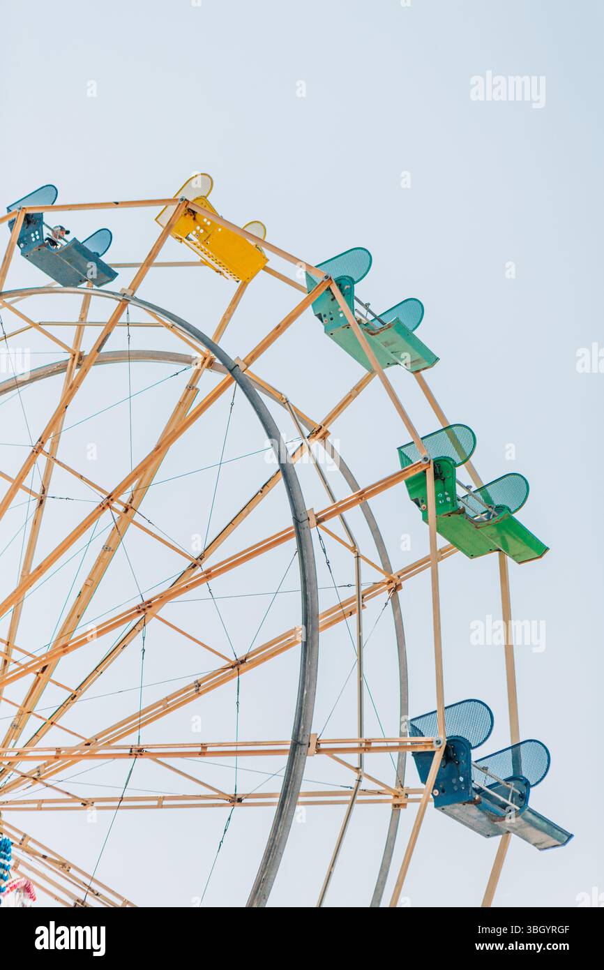 Colorful Ferris wheel chairs under blue sky at Santa Cruz Pier Stock ...