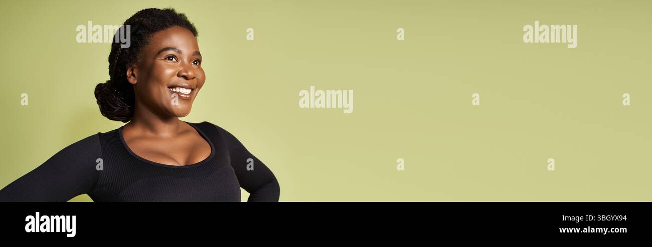 A driven young Black athlete powers through a workout, exuding ...