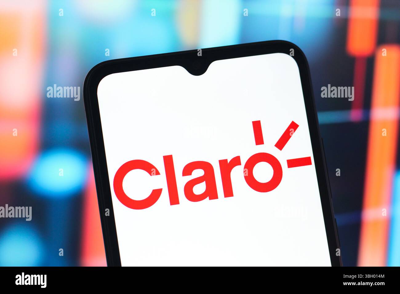 In this photo illustration, the Claro logo is seen displayed on a ...