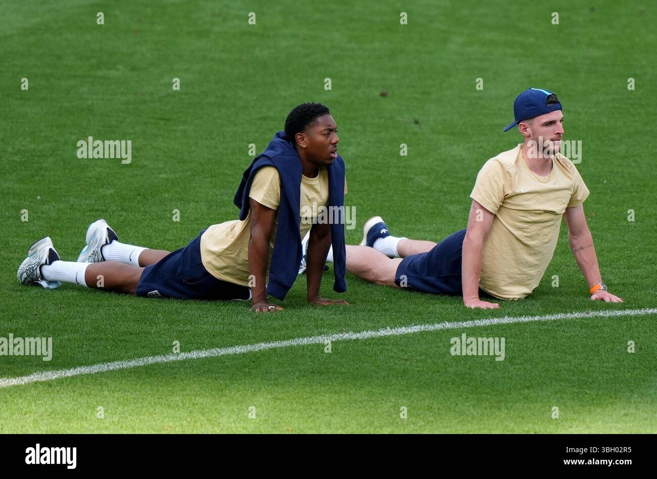 England's Declan Rice and Myles Lewis-Skelly during a pitch walk at the ...