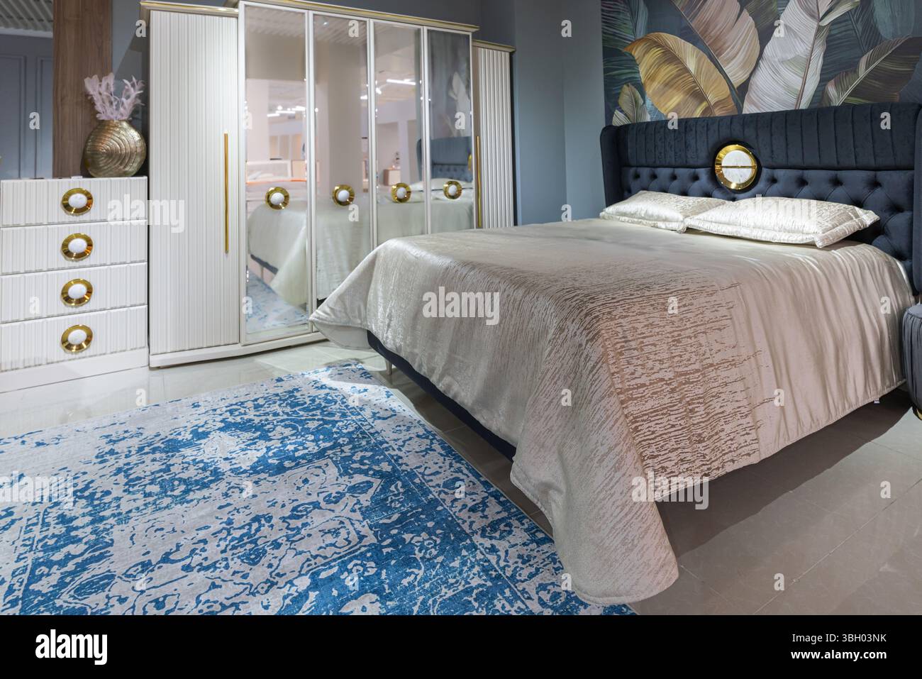 Modern Luxury Bedroom Interior with Mirrored Wardrobe and Tropical ...