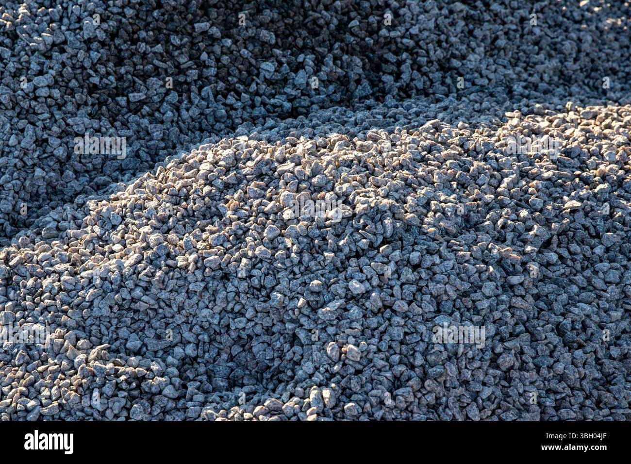 Big pile of crushed stone or gravel used for construction projects ...