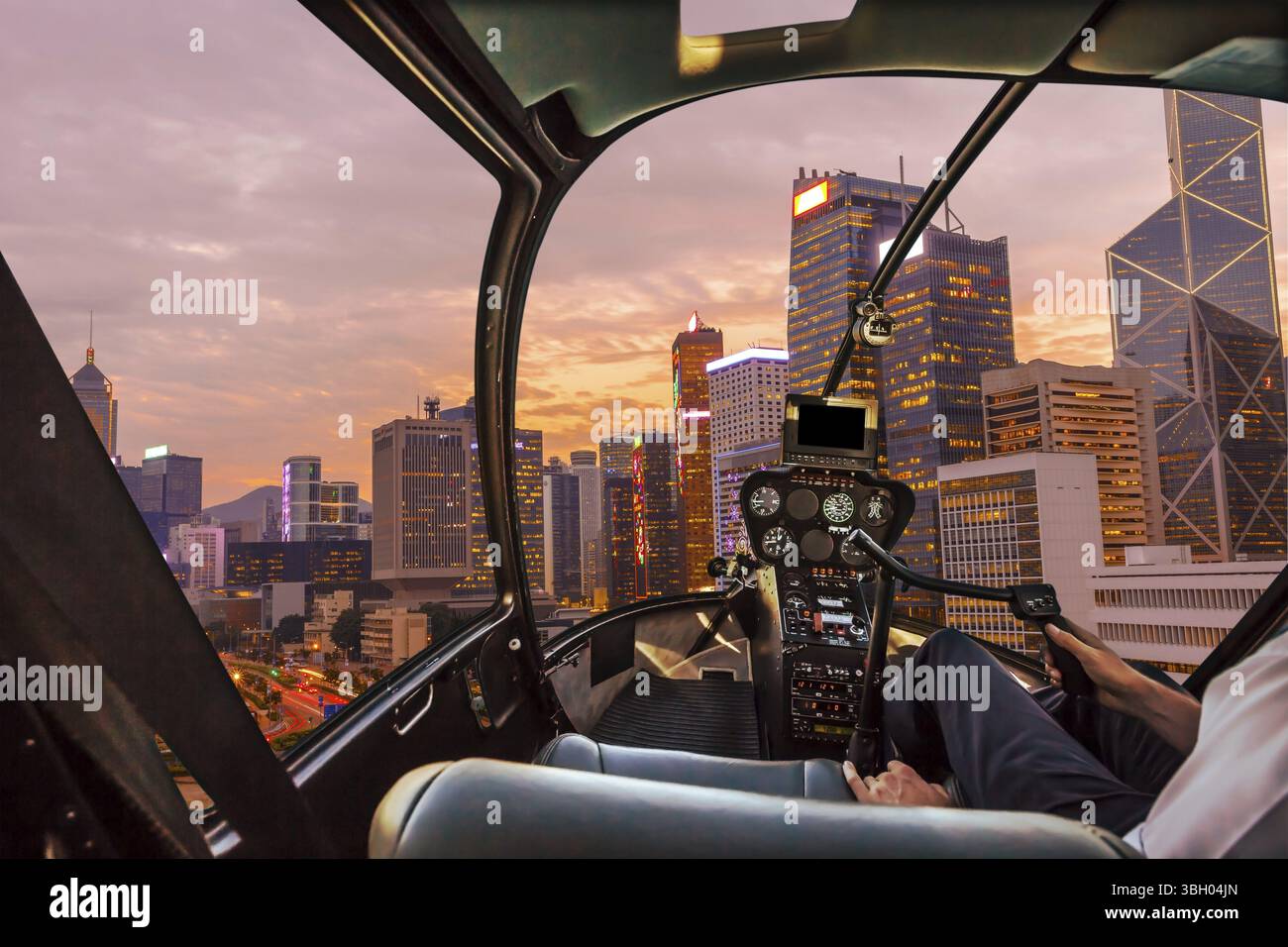 Helicopter cockpit flying aerial view of cityscape of landmark ...