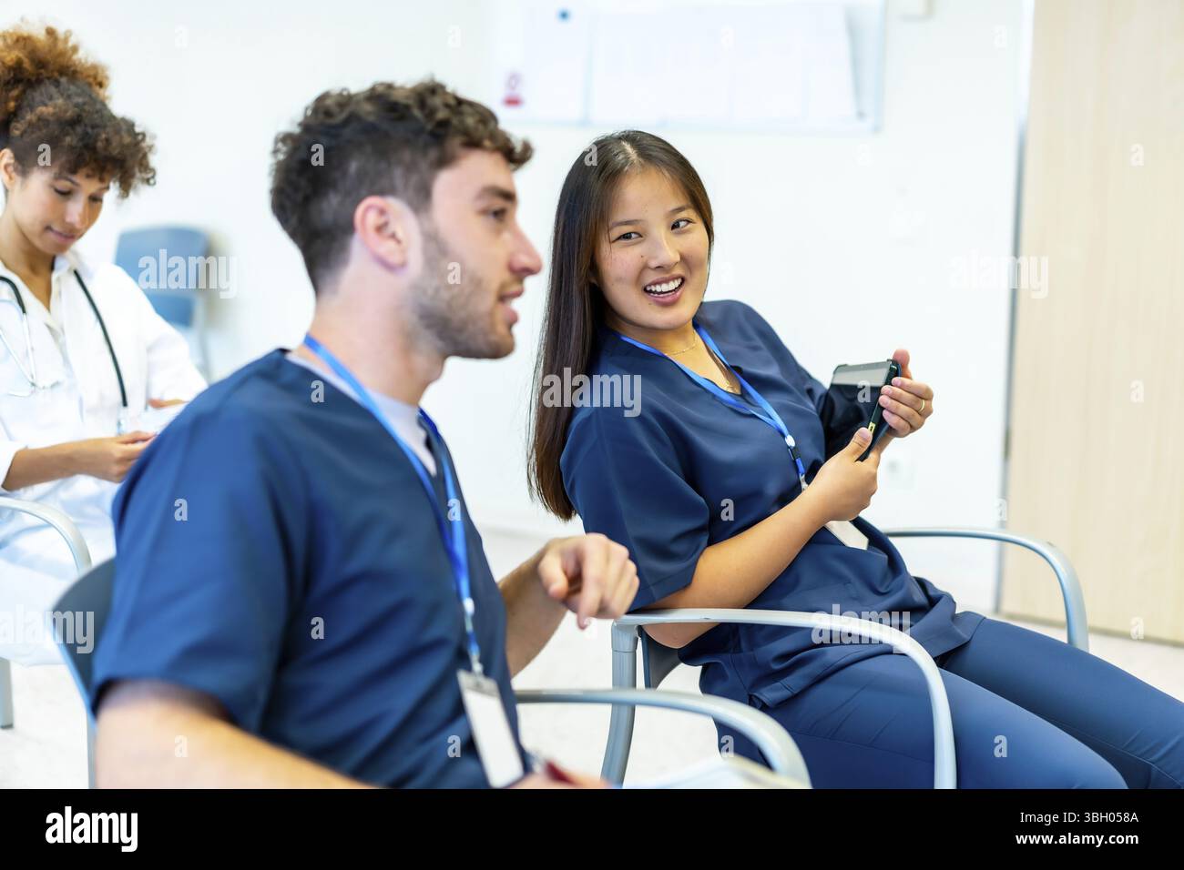 Group of medical professionals attending a conference, actively ...