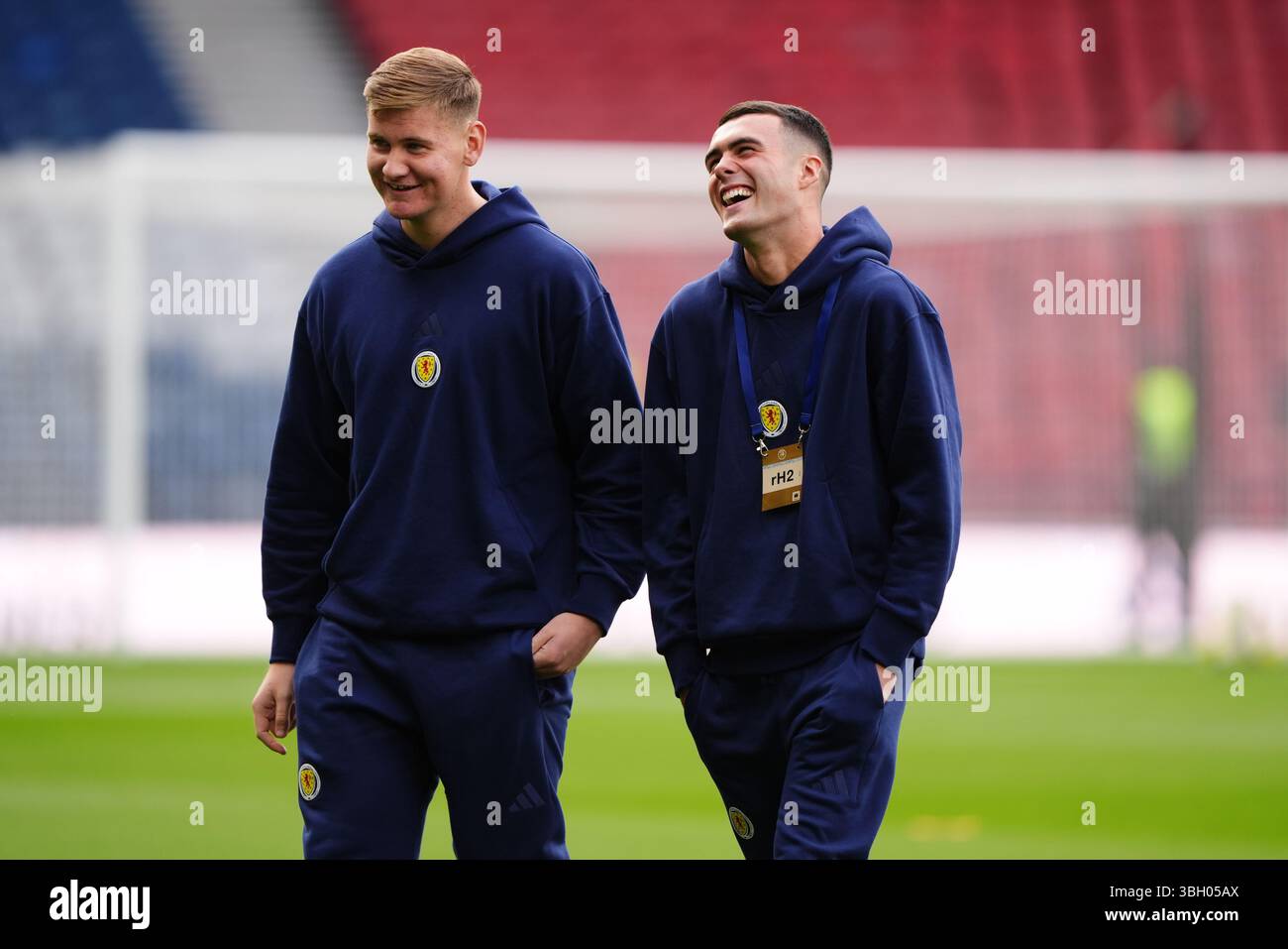 Scotland's Lennon Miller (right) and goalkeeper Callan McKenna ahead of ...