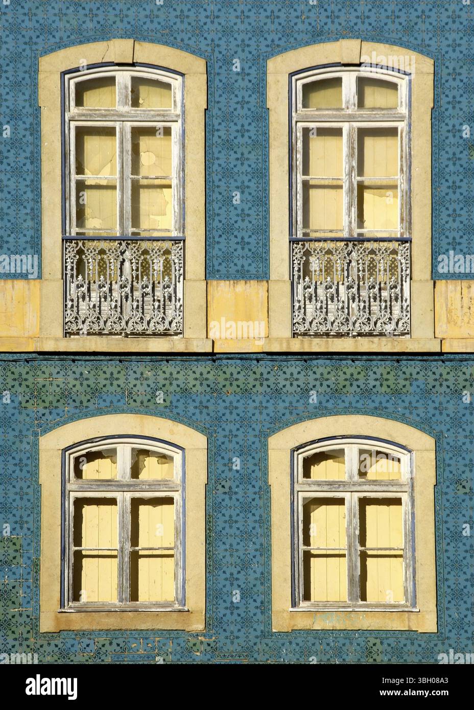 Old windows on tiled facade in Silves, Algarve - Portugal Stock Photo ...