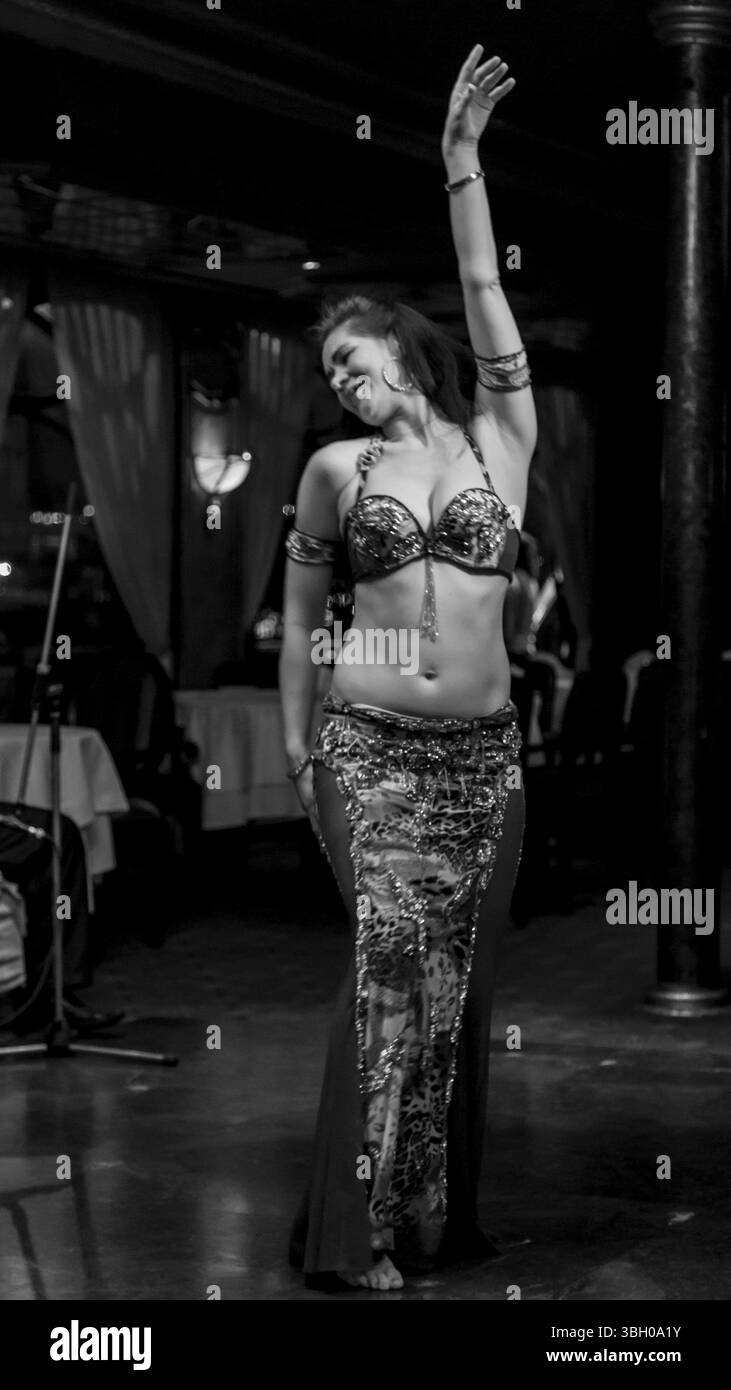 A woman performs the traditional Egyptian Belly Dance on a dinner ...