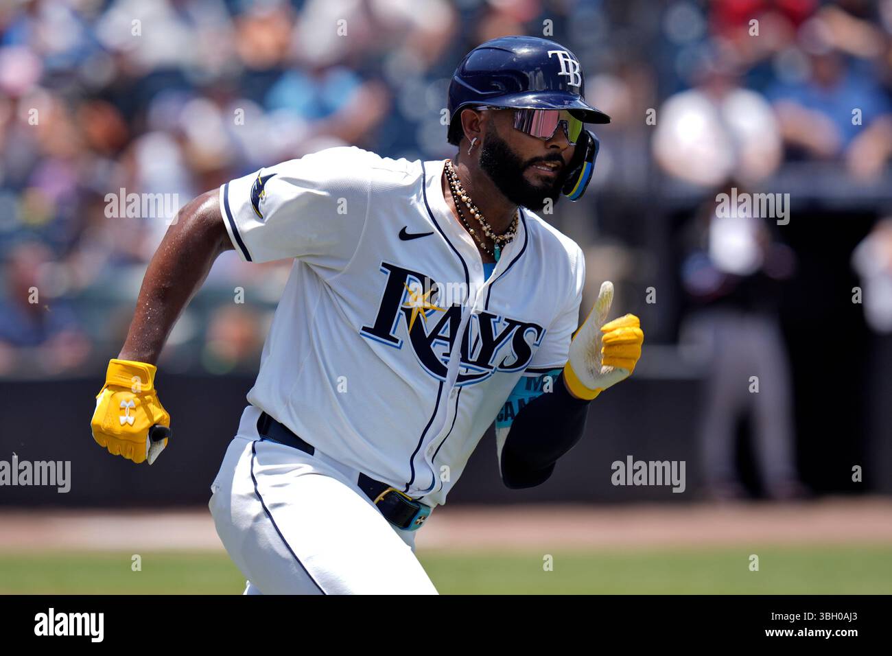 Tampa Bay Rays' Junior Caminero runs the bases after his double off ...